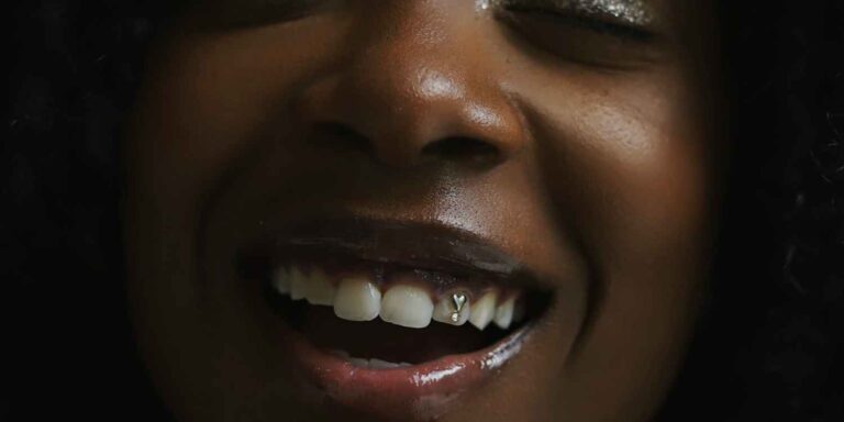 Celebrity Smiles: The Influence of Tooth Gems in Pop